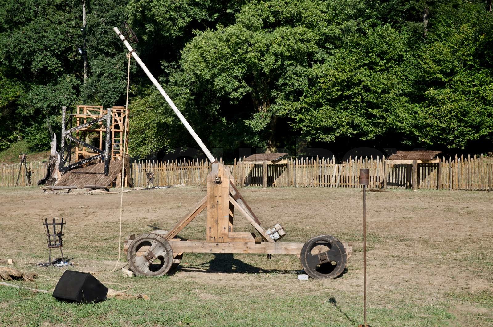 Side view of a medieval wooden catapult. | Stock image | Colourbox