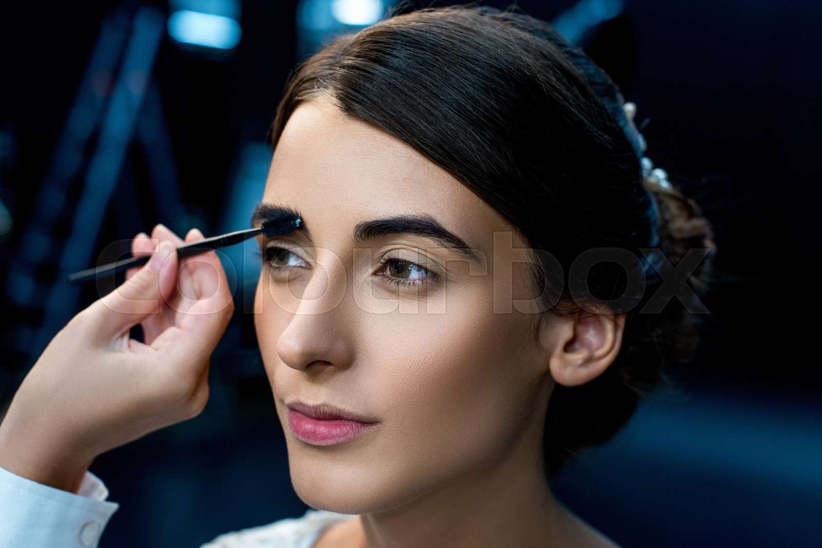 woman getting makeup done | Stock image | Colourbox