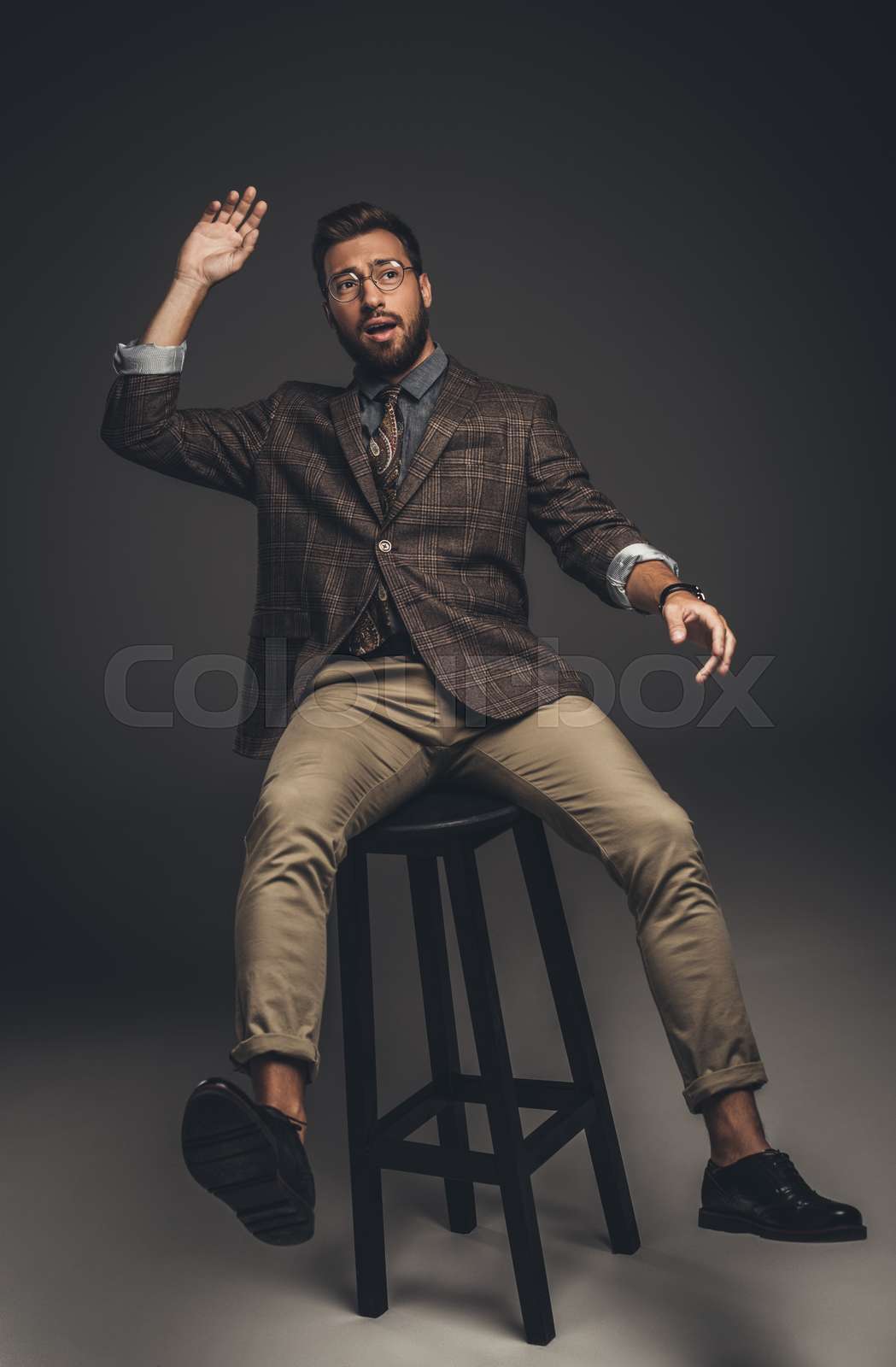 man falling from bar stool | Stock image | Colourbox