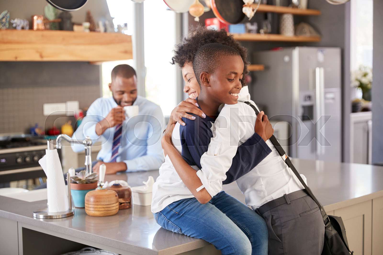 Mother Saying Goodbye To Son As She Leaves For Work | Stock image ...