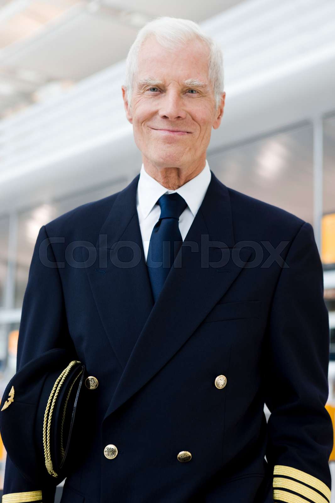 Flight captain smiling at viewer | Stock image | Colourbox