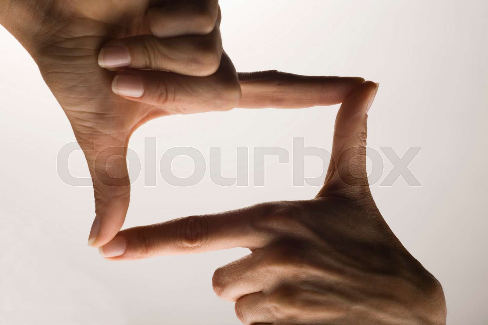 Hands forming frame | Stock image | Colourbox