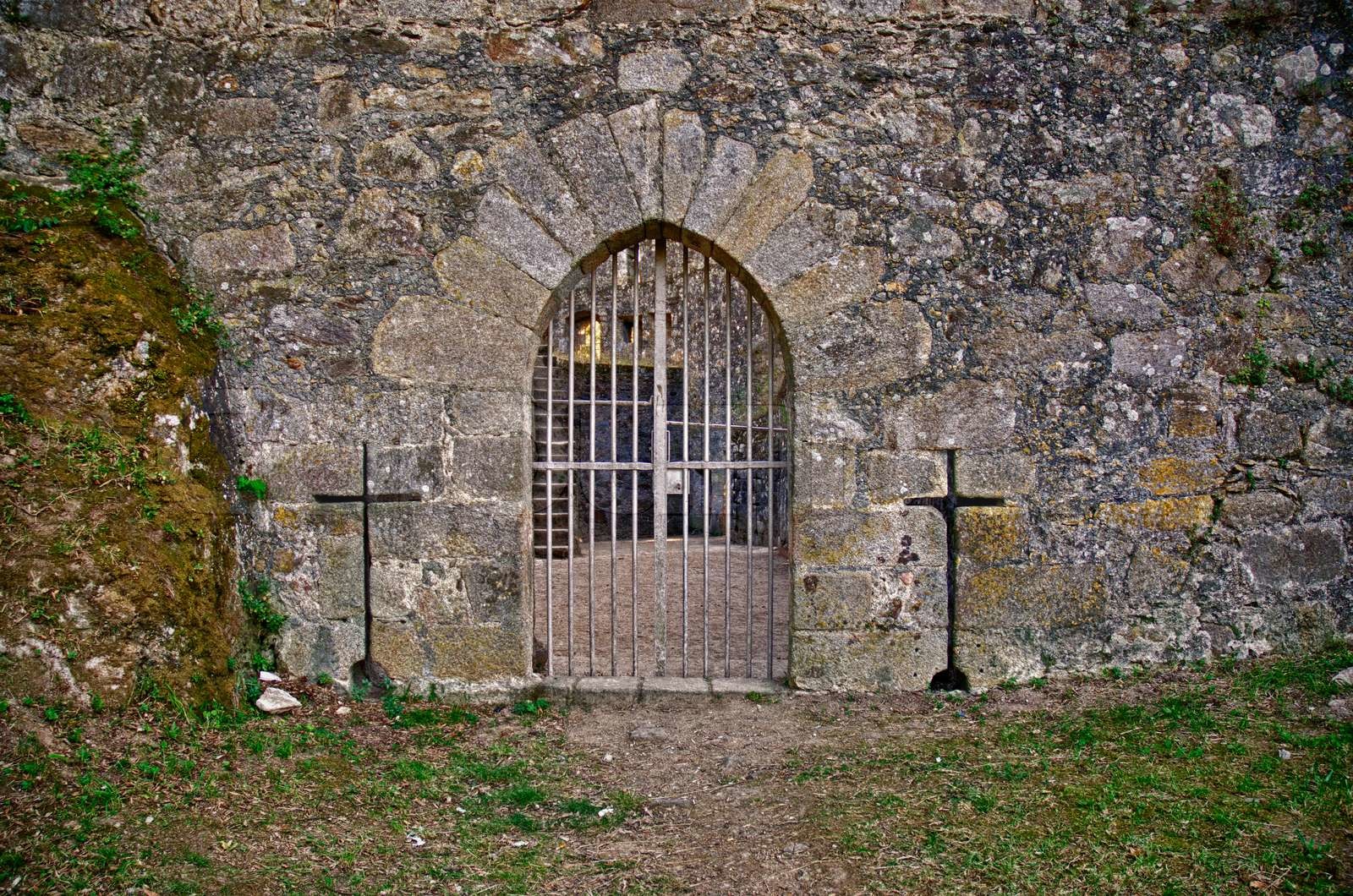 Old medieval castle gate in a fortified granite wall | Stock image ...