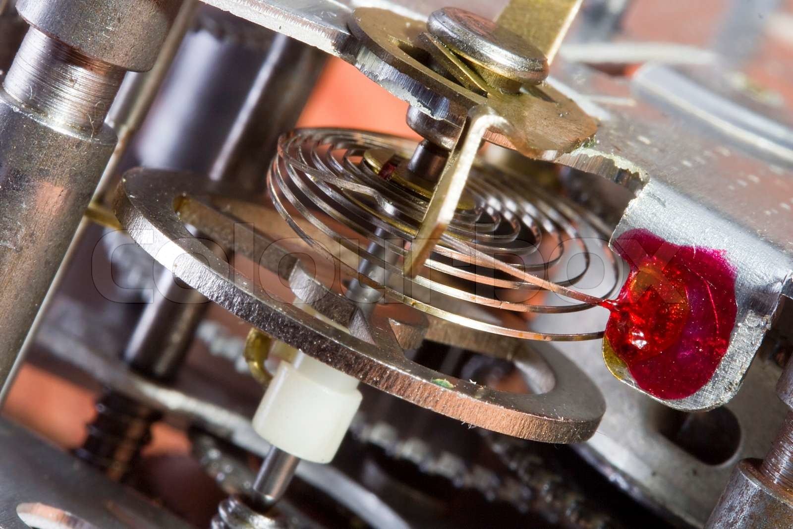 Close-up photograph of a silver gear mechanism | Stock image | Colourbox