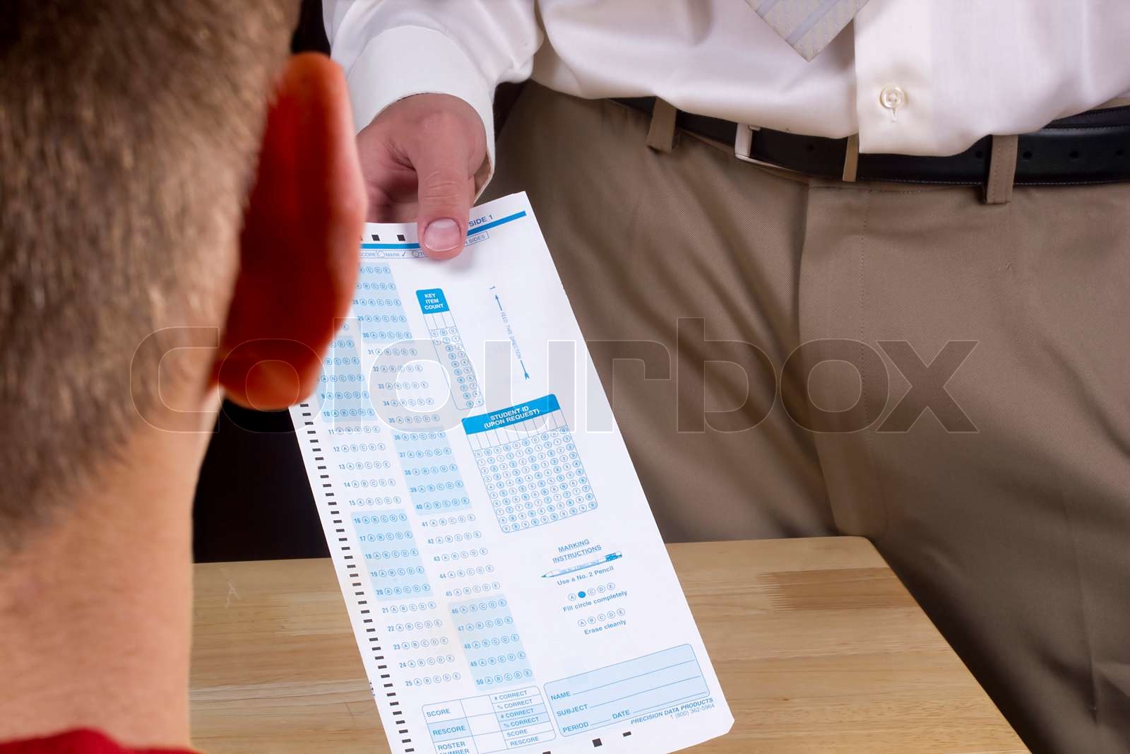 Teacher Giving A Multiple Choice Test To A Student Stock Image Colourbox teacher-giving-a-multiple-choice-test-to-a-student-stock-image-colourbox