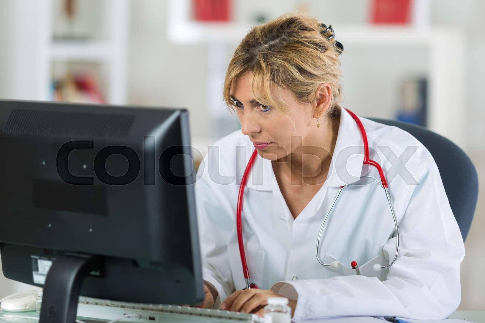 doctor using a computer | Stock image | Colourbox