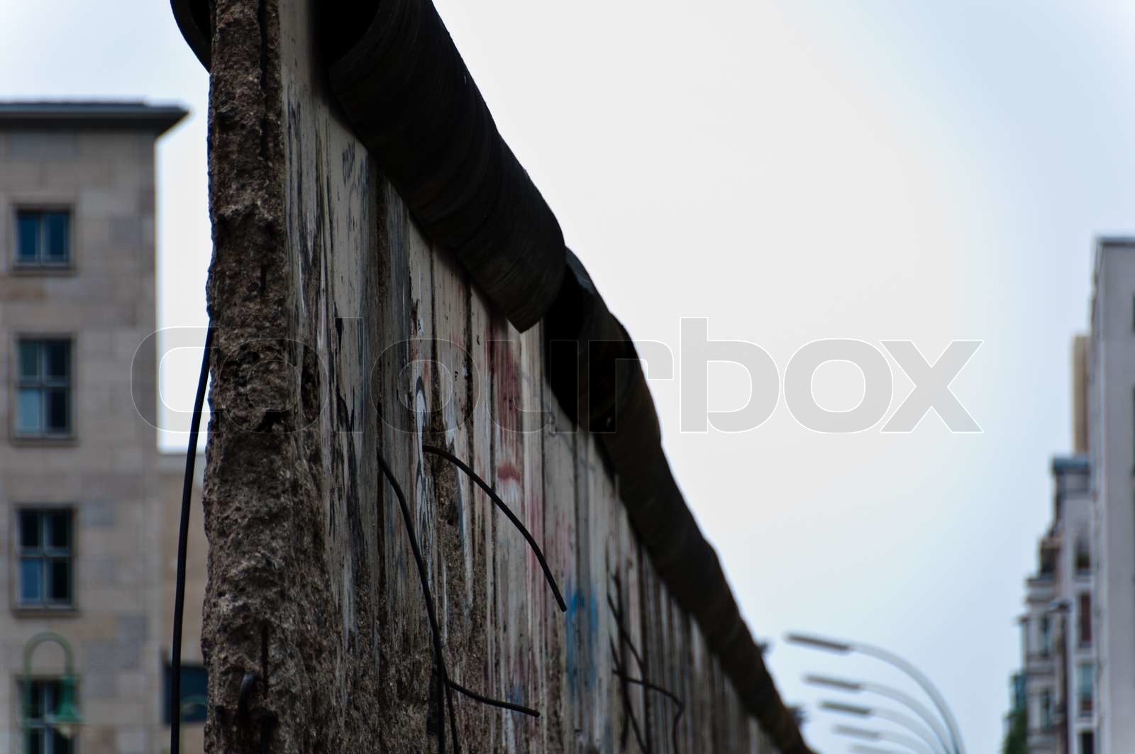 Part of the Berlin wall still left as a monument separating eastern and ...