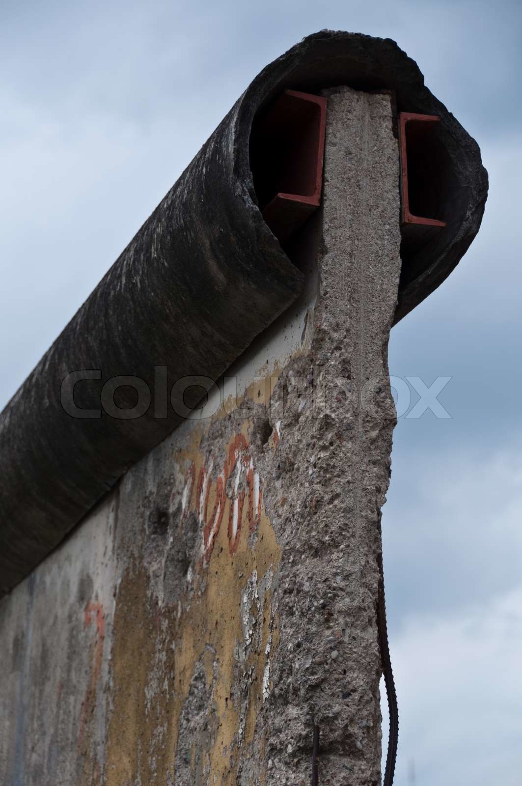 Part of the Berlin wall still left as a monument separating eastern and ...