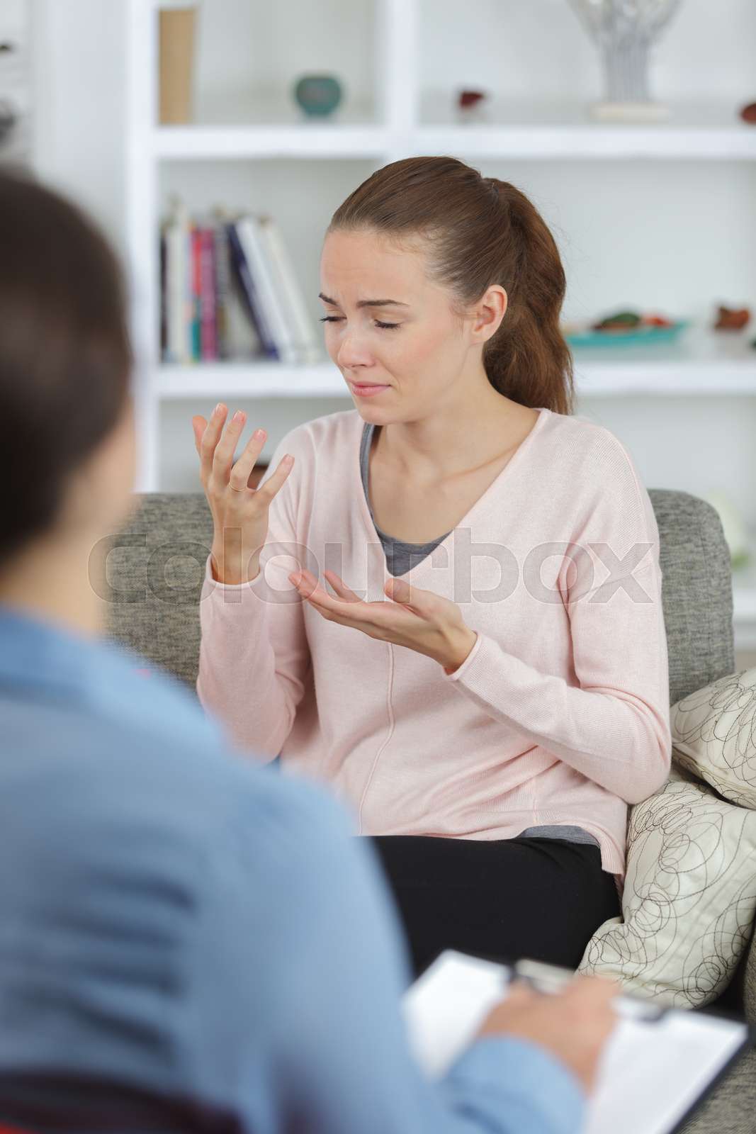 professional psychologist talking with her client | Stock image | Colourbox