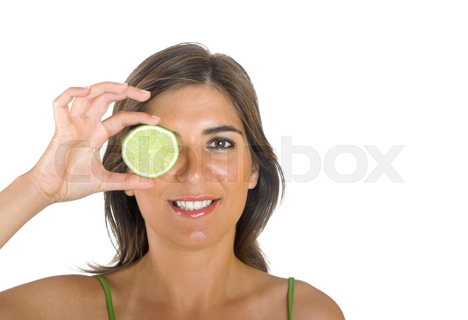 Eating a lime | Stock image | Colourbox