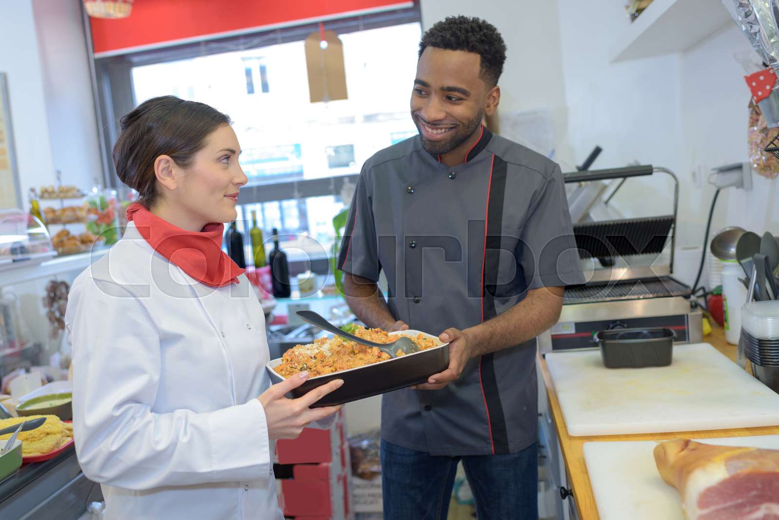 helping a co-worker | Stock image | Colourbox