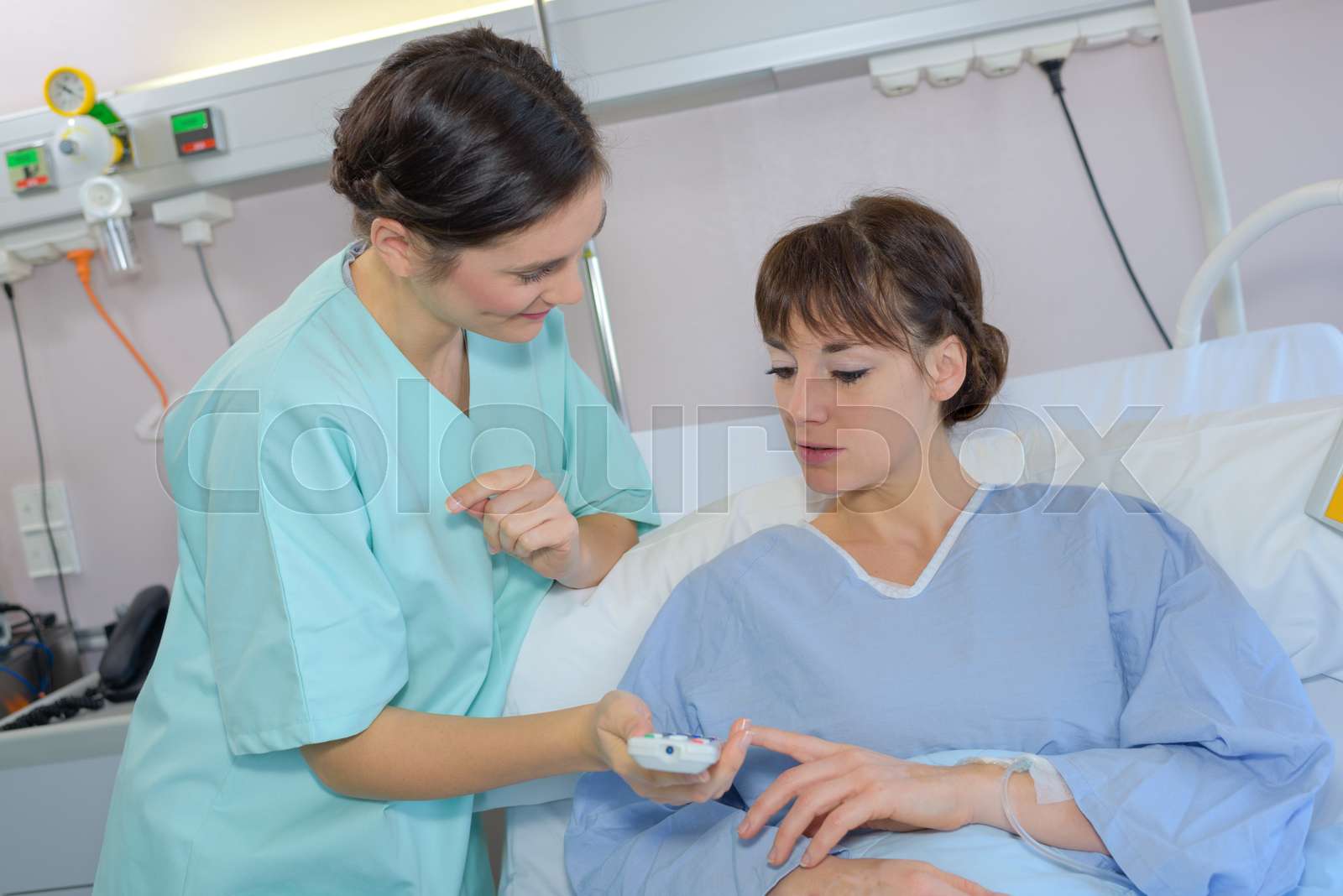 nurse giving instructions to patient | Stock image | Colourbox