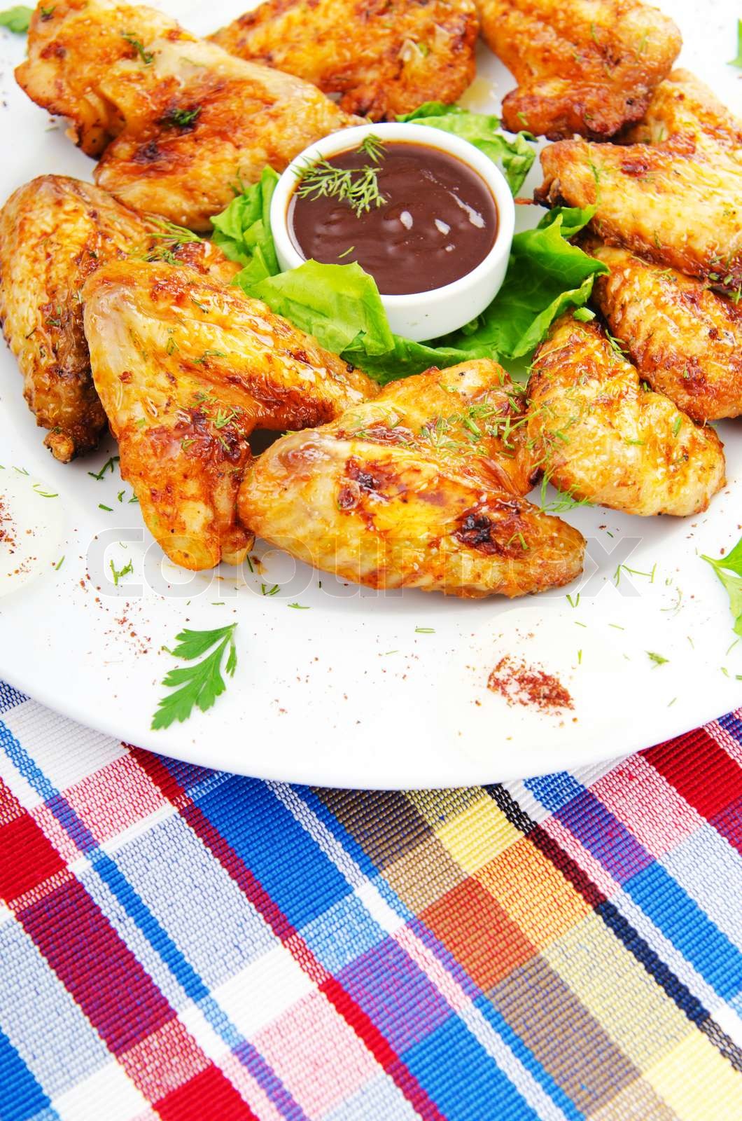 Chicken wings in the plate | Stock image | Colourbox