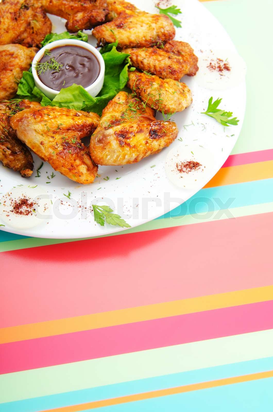 Chicken wings in the plate | Stock image | Colourbox
