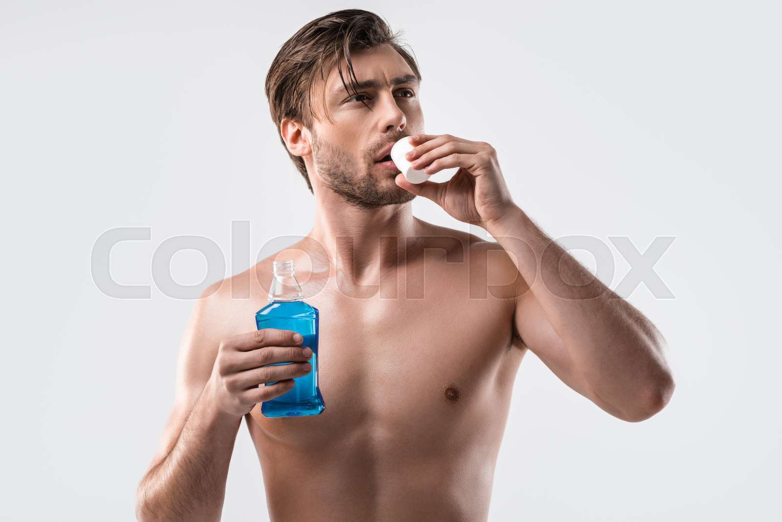 man with mouth rinse | Stock image | Colourbox