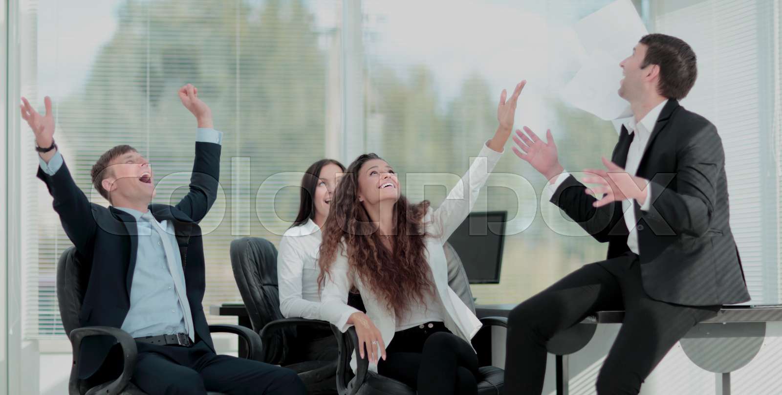 Successful and confident business team celebrating win | Stock image ...