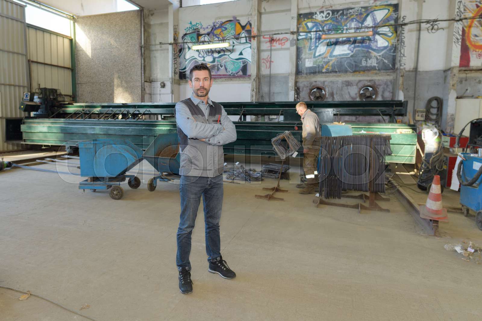 man owner in factory | Stock image | Colourbox