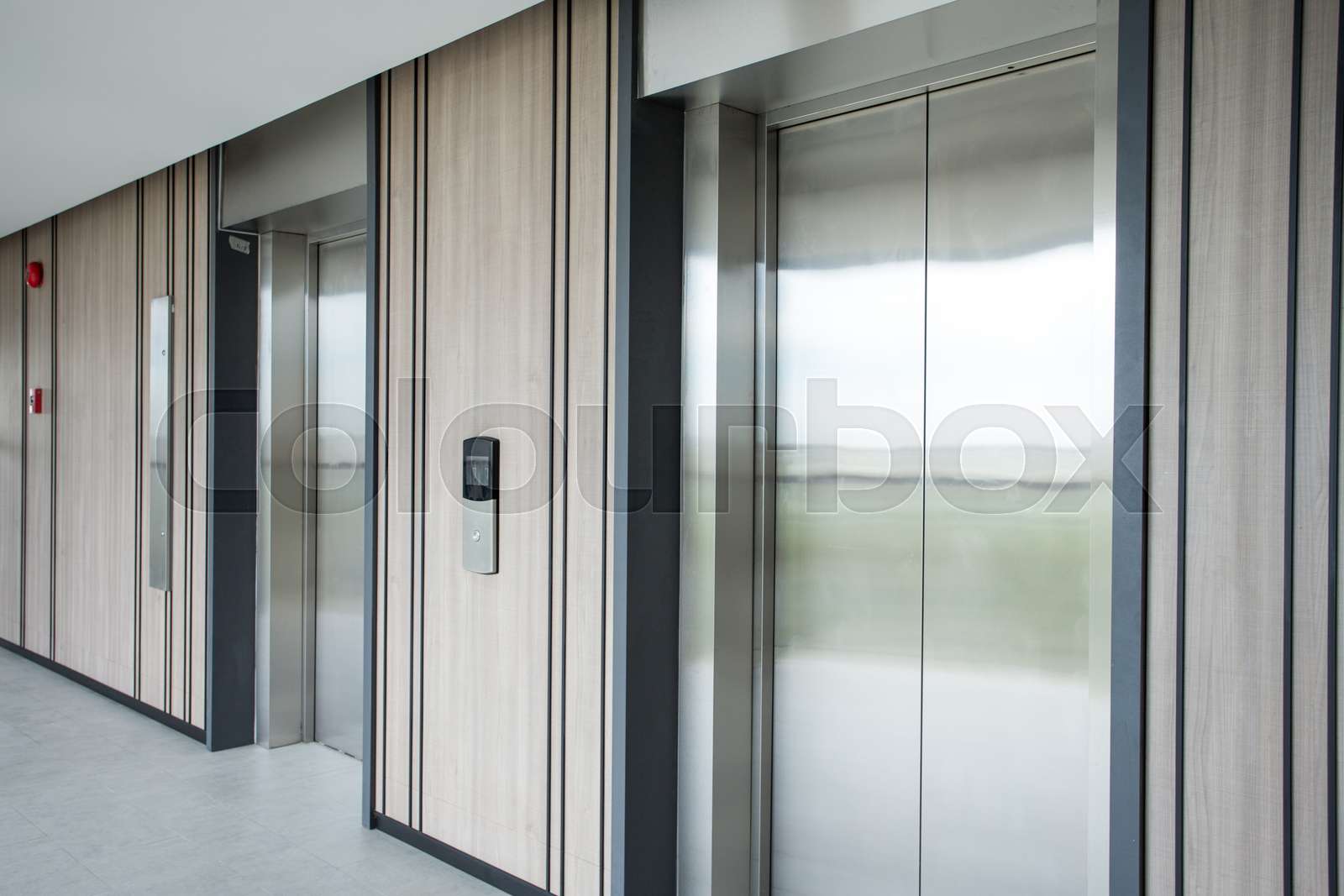 modern elevator made of metal in building | Stock image | Colourbox