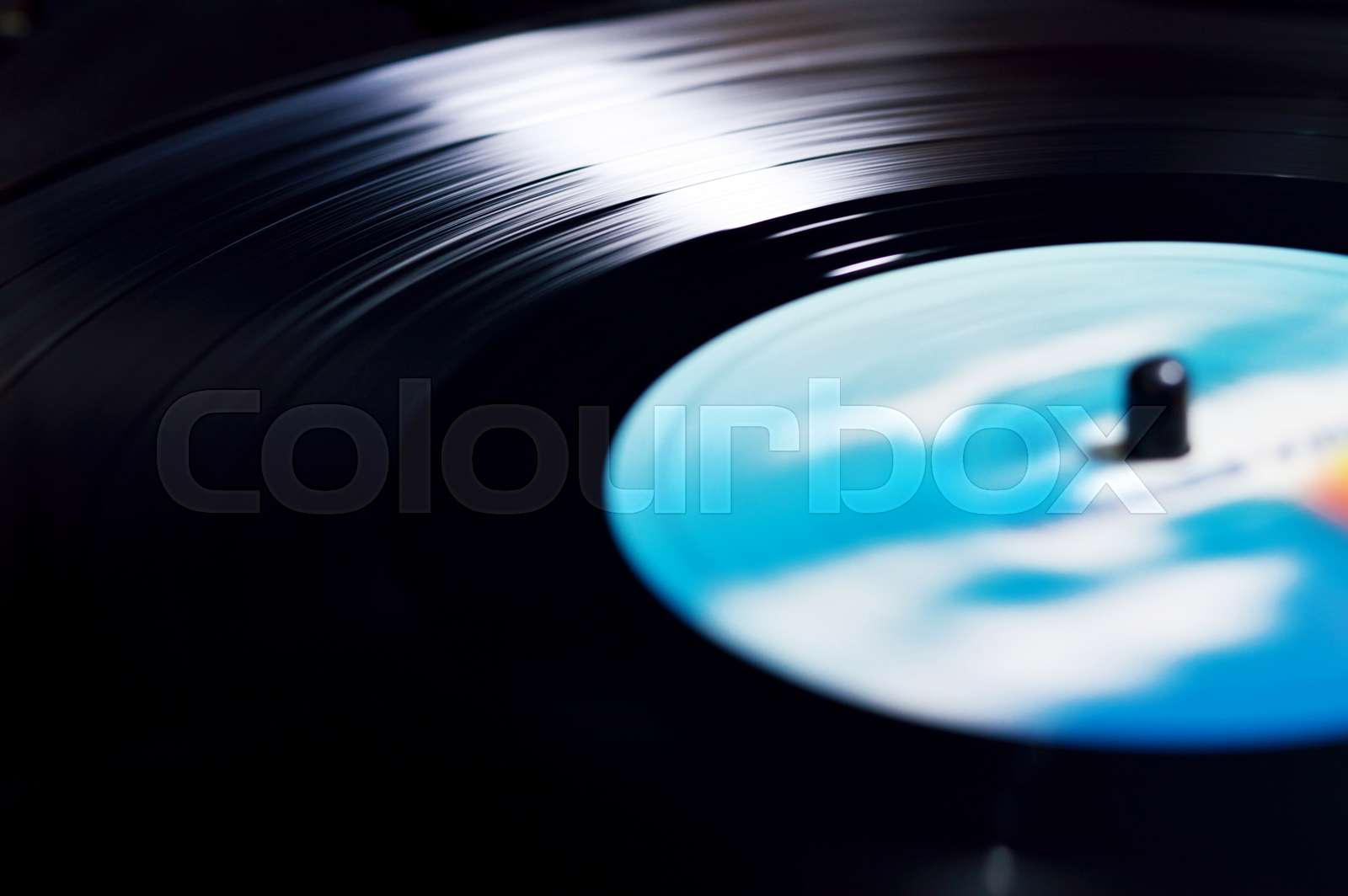 vinyl disc spinning on turntable | Stock image | Colourbox