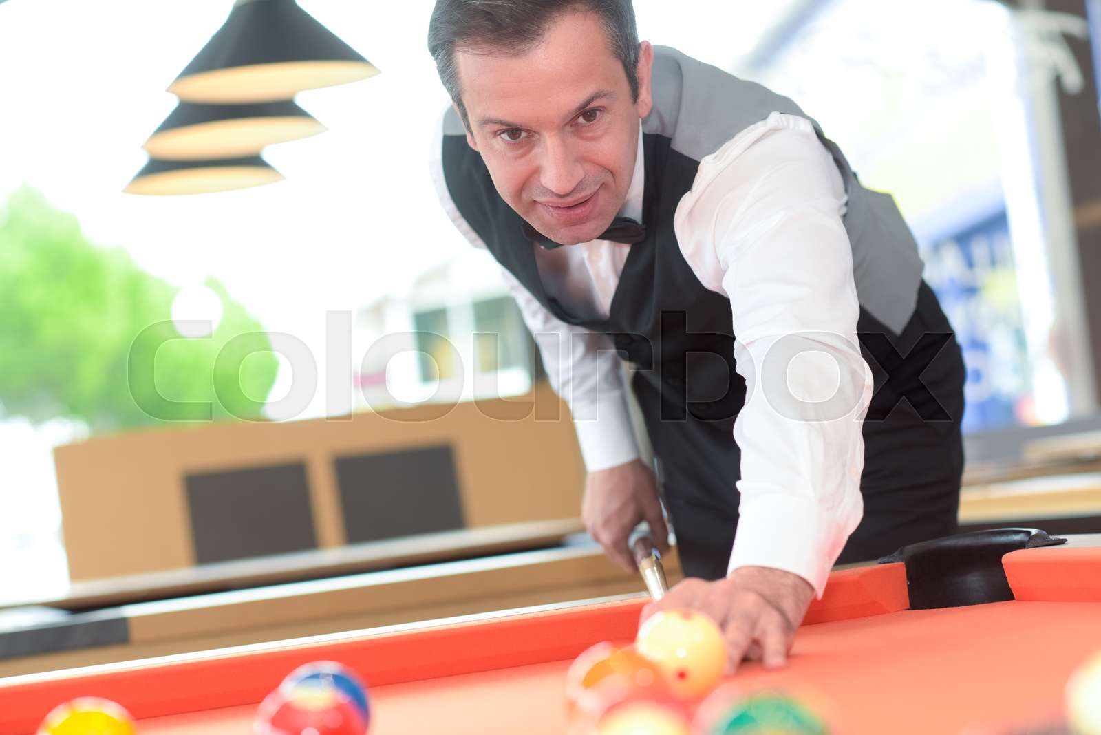 man playing pool | Stock image | Colourbox