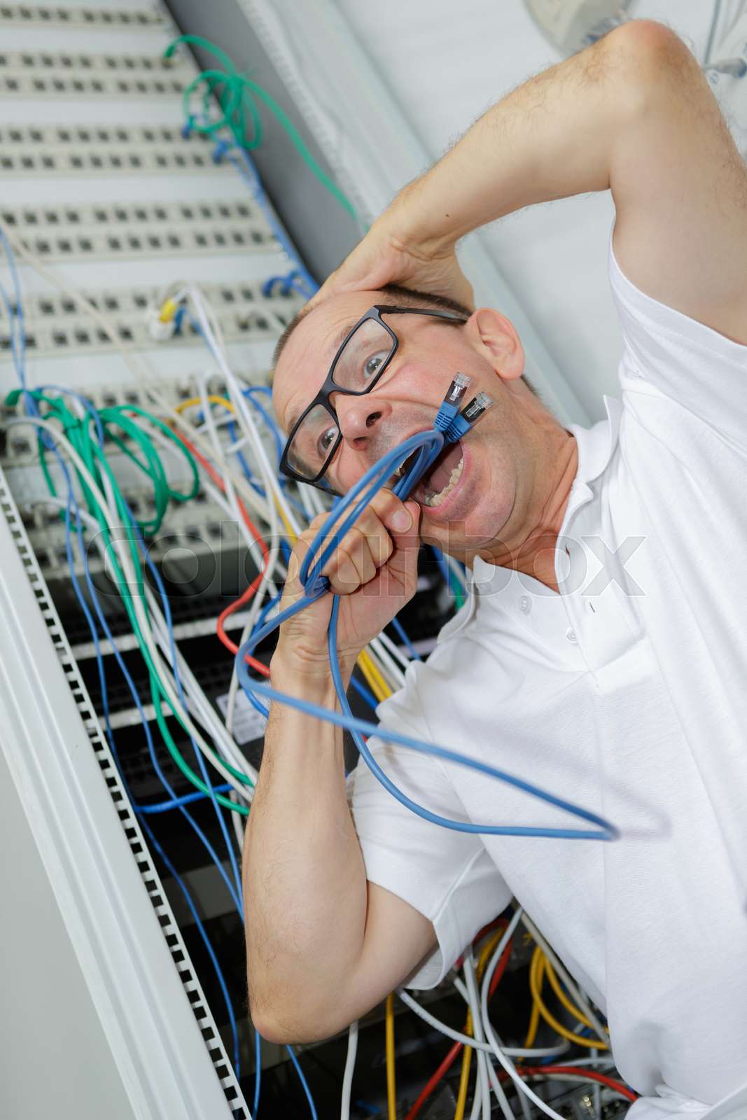 confused it professional with cables in a data center | Stock image ...