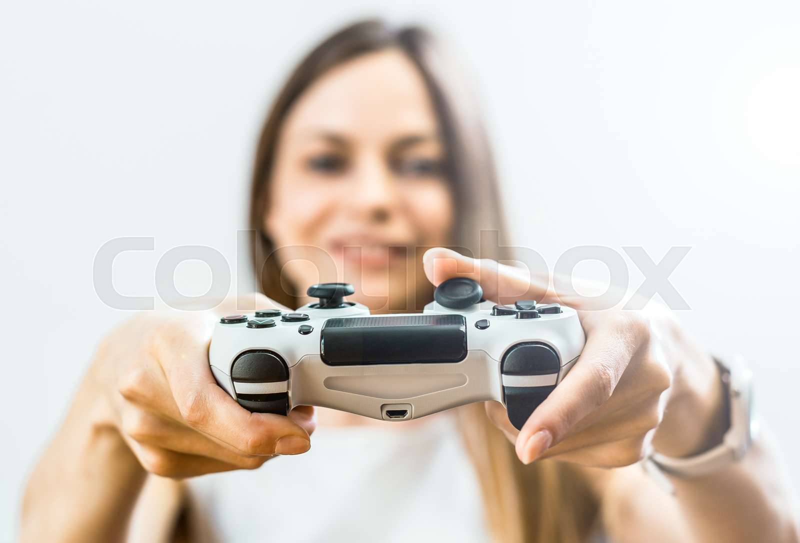 Lovely Girl Plays Video Game | Stock image | Colourbox