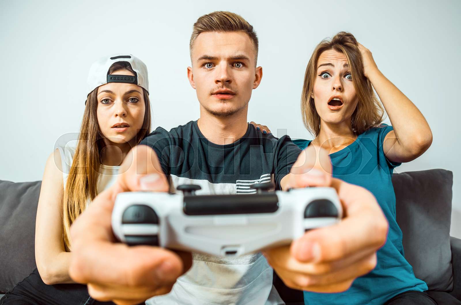 Teens Having Fun Playing Video Game | Stock image | Colourbox