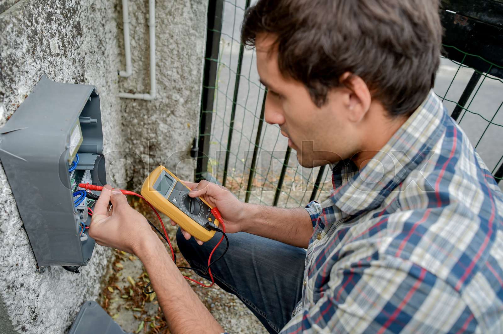 man reading meter | Stock image | Colourbox