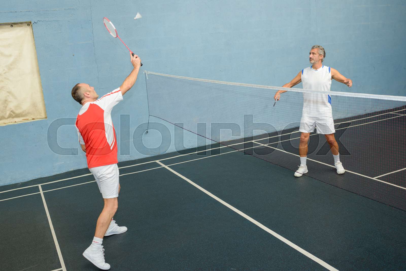 men playing badminton | Stock image | Colourbox