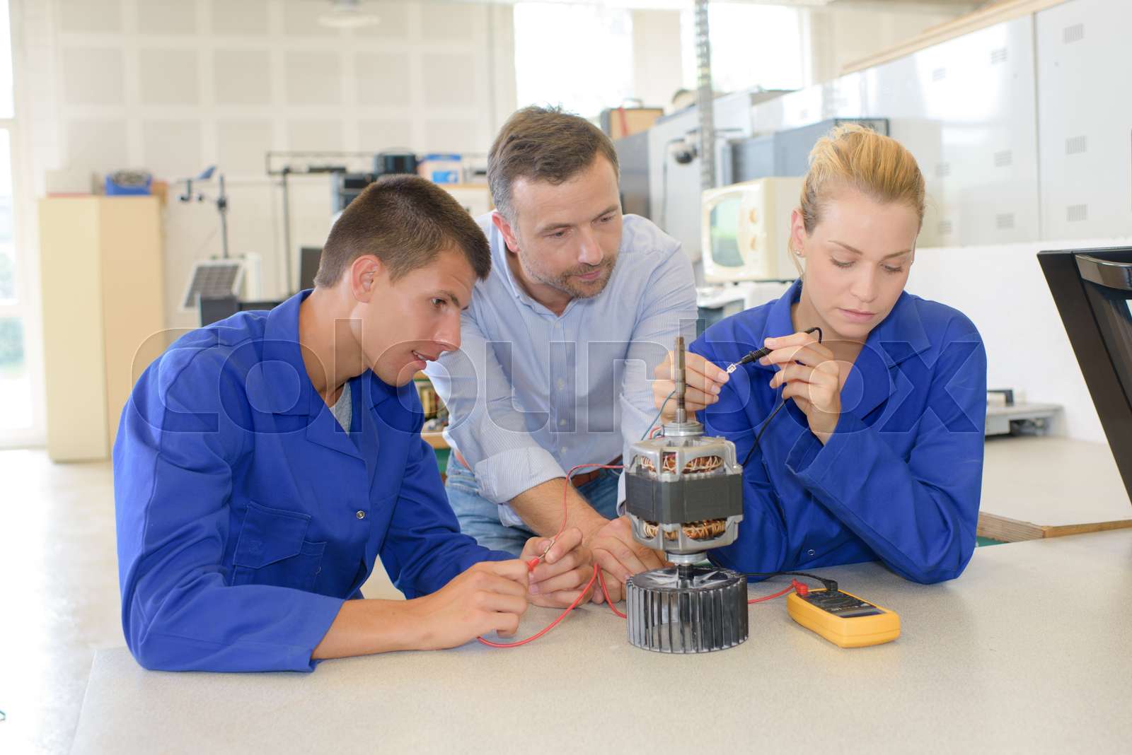 apprentices with a teacher | Stock image | Colourbox