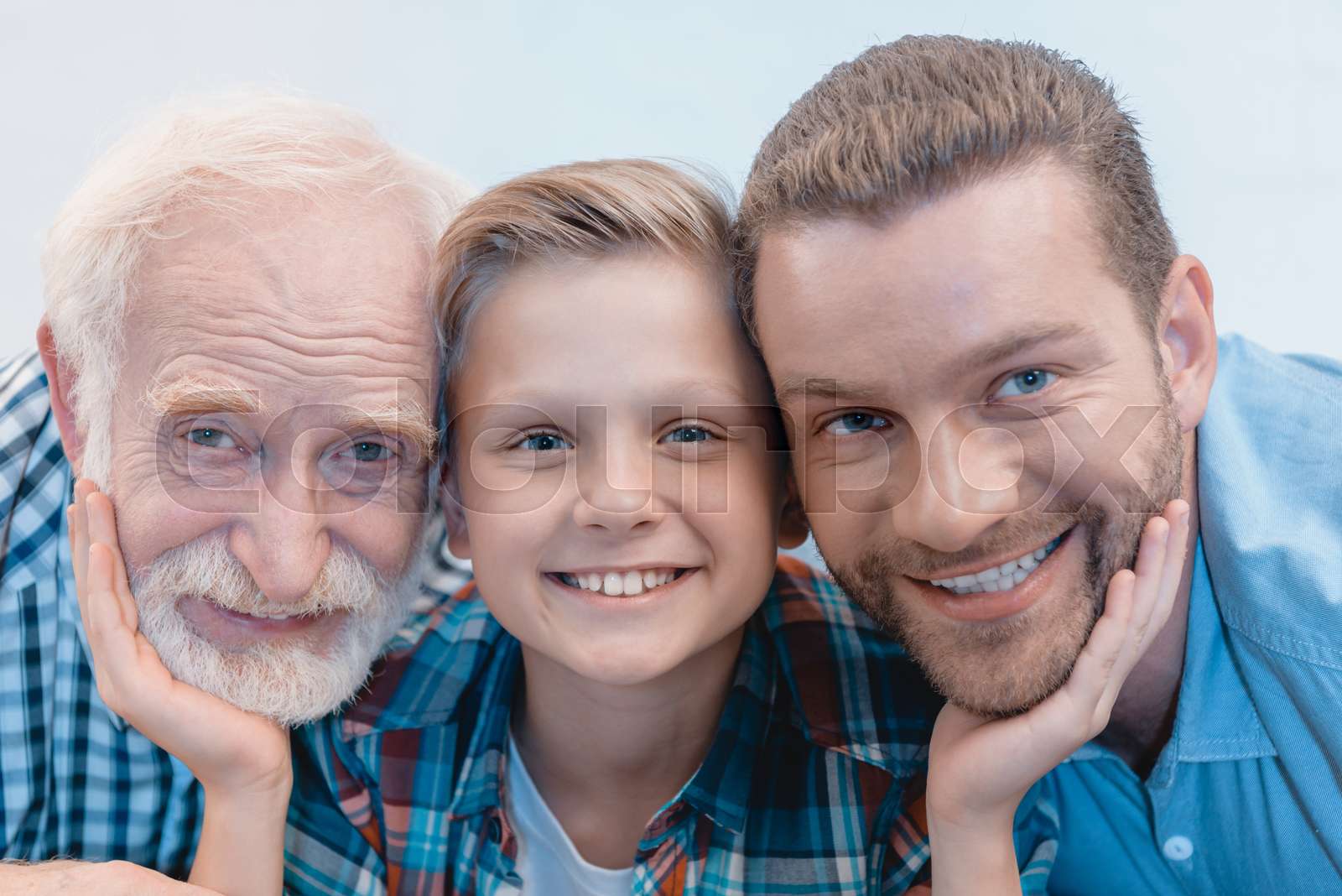 Family portrait of grandfather, father and son | Stock image | Colourbox