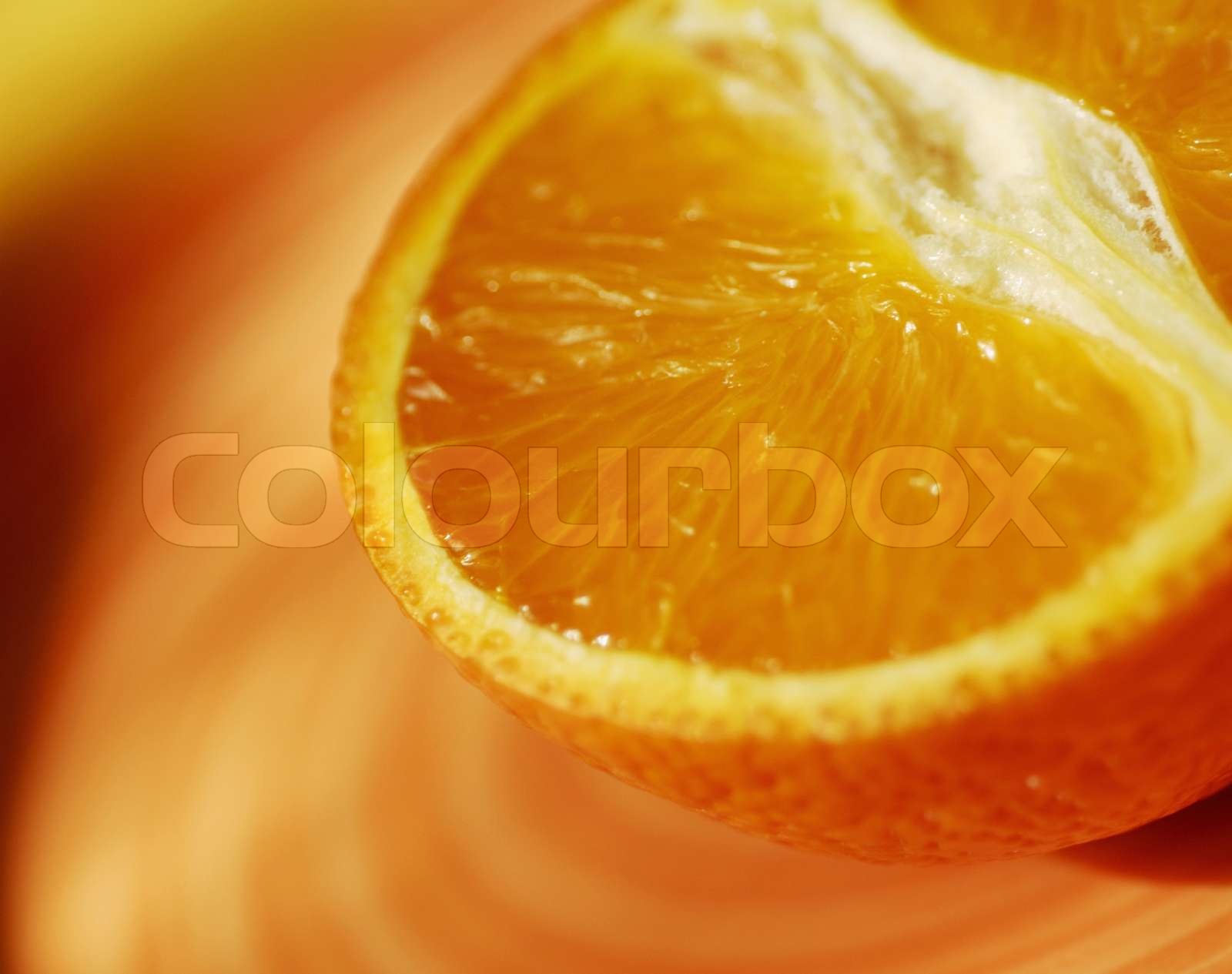 Close-up of the cross section of an orange | Stock image | Colourbox