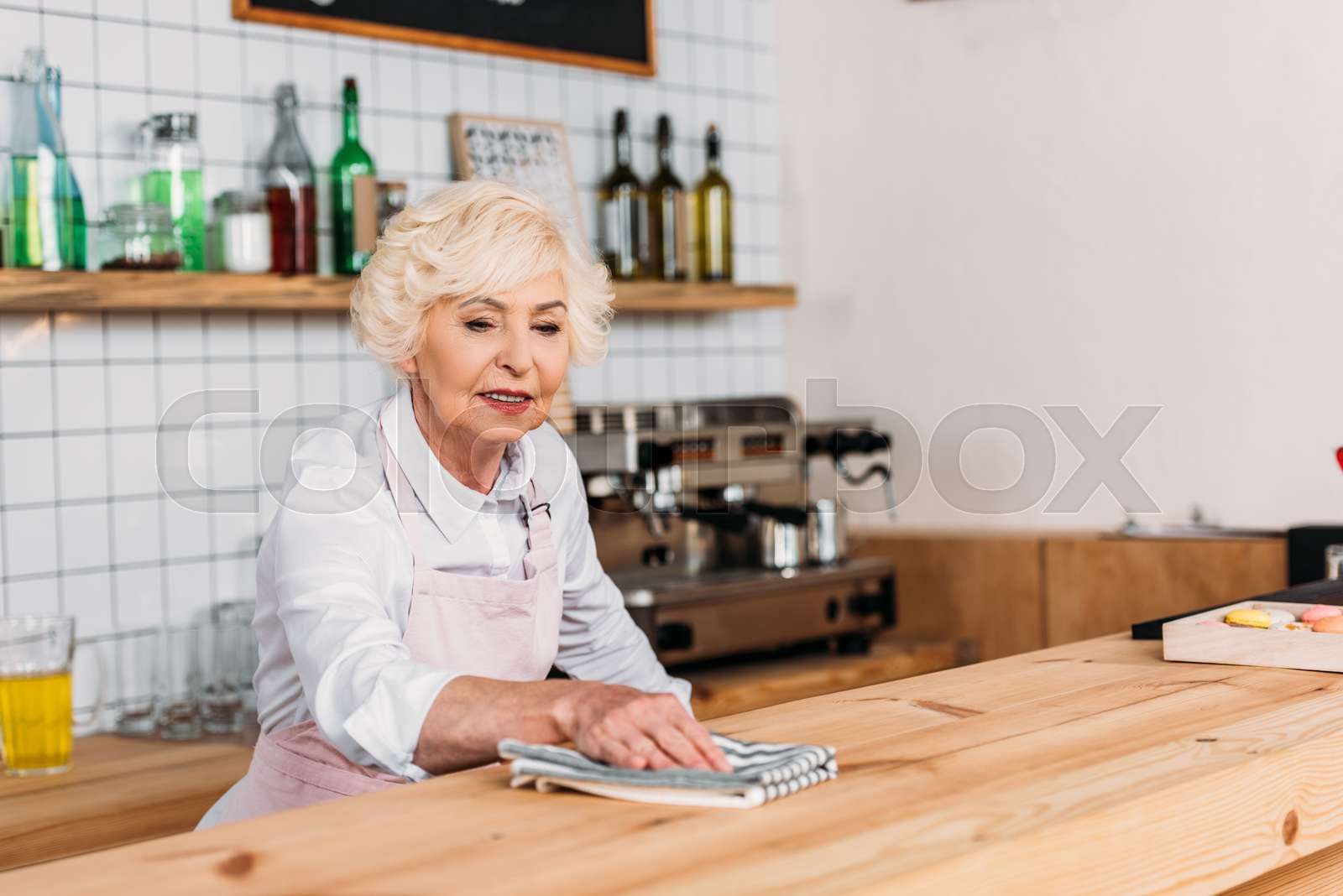 worker cleaning counter | Stock image | Colourbox