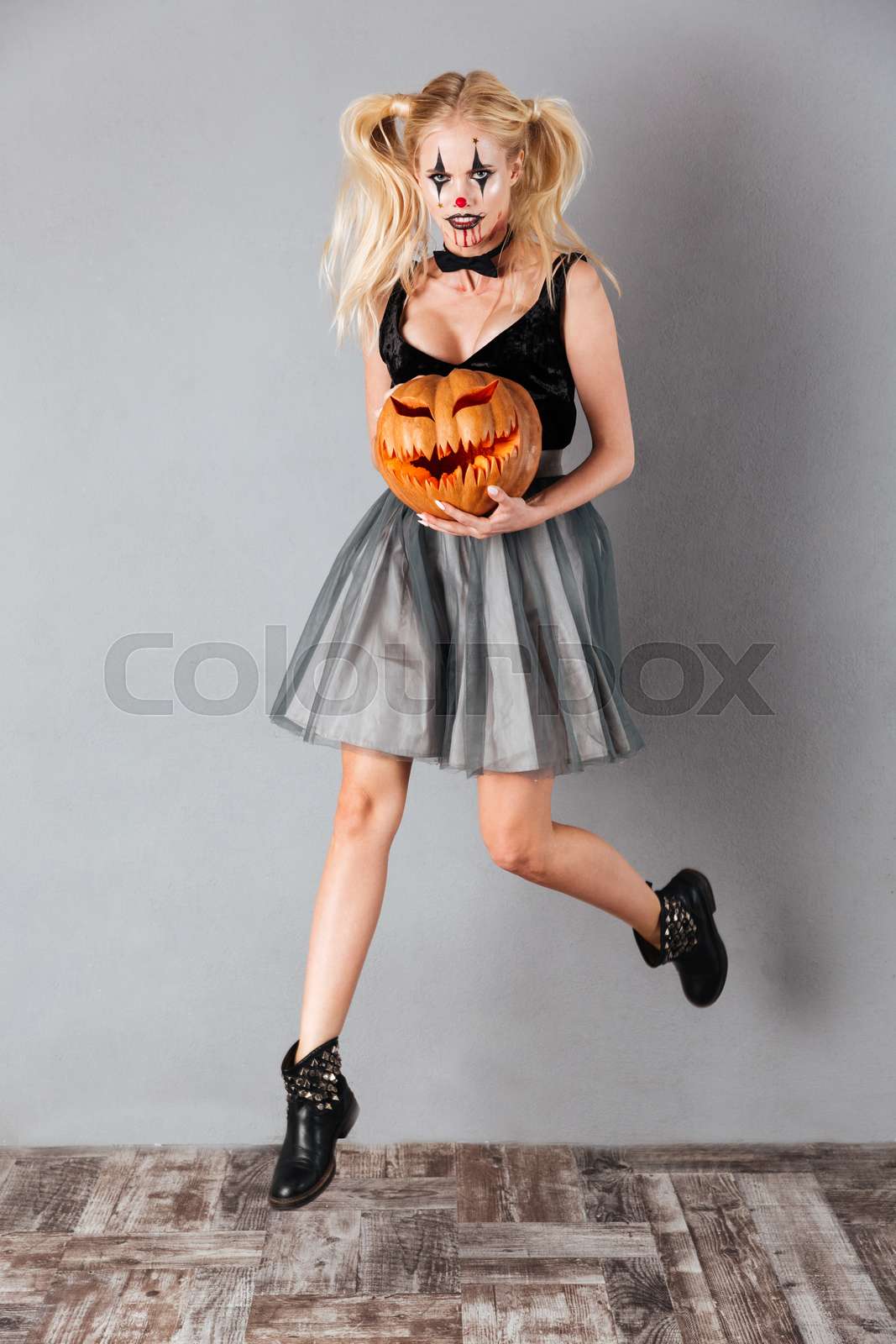 Full length portrait of a scary crazy blonde woman | Stock image ...