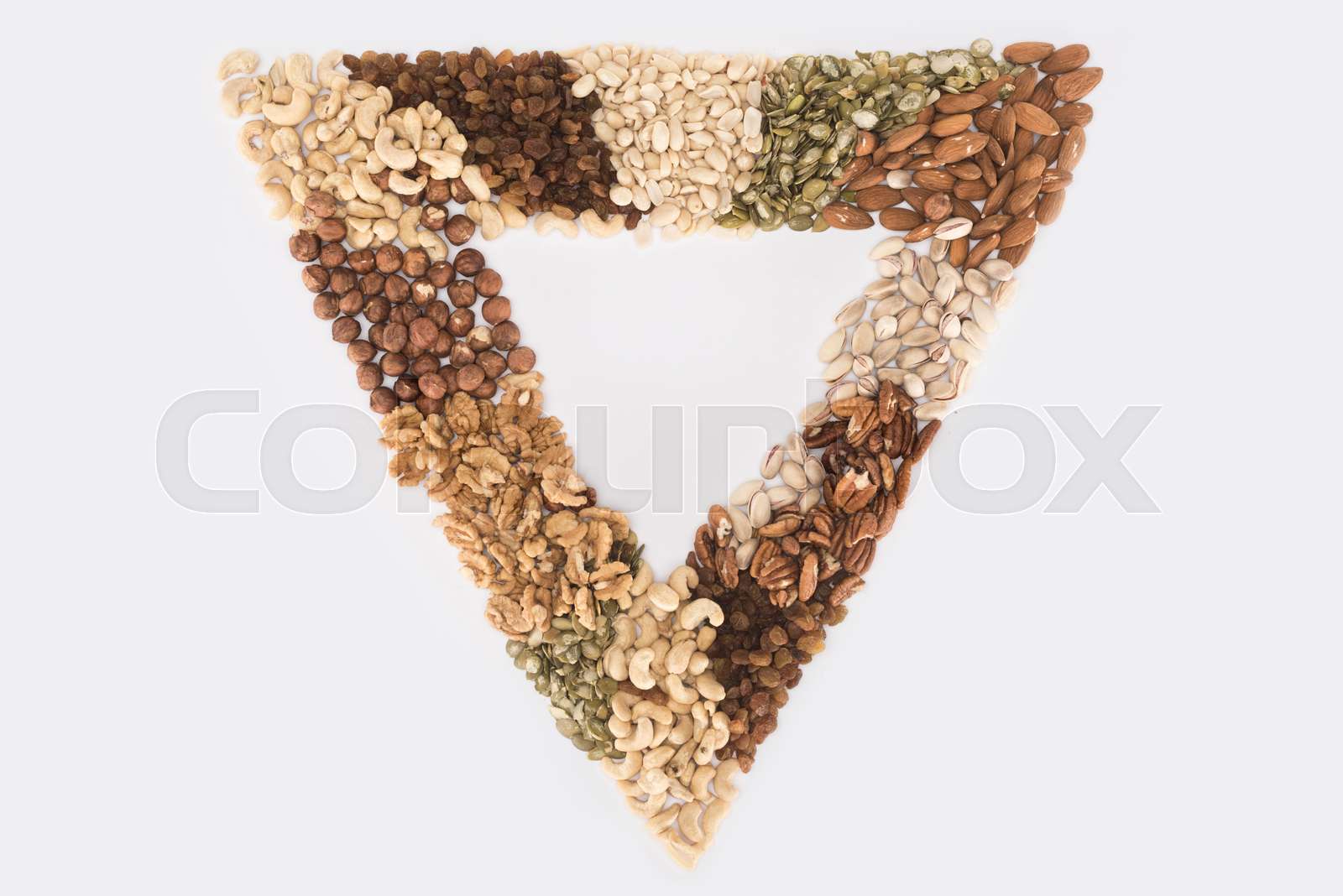 triangle symbol from nuts | Stock image | Colourbox