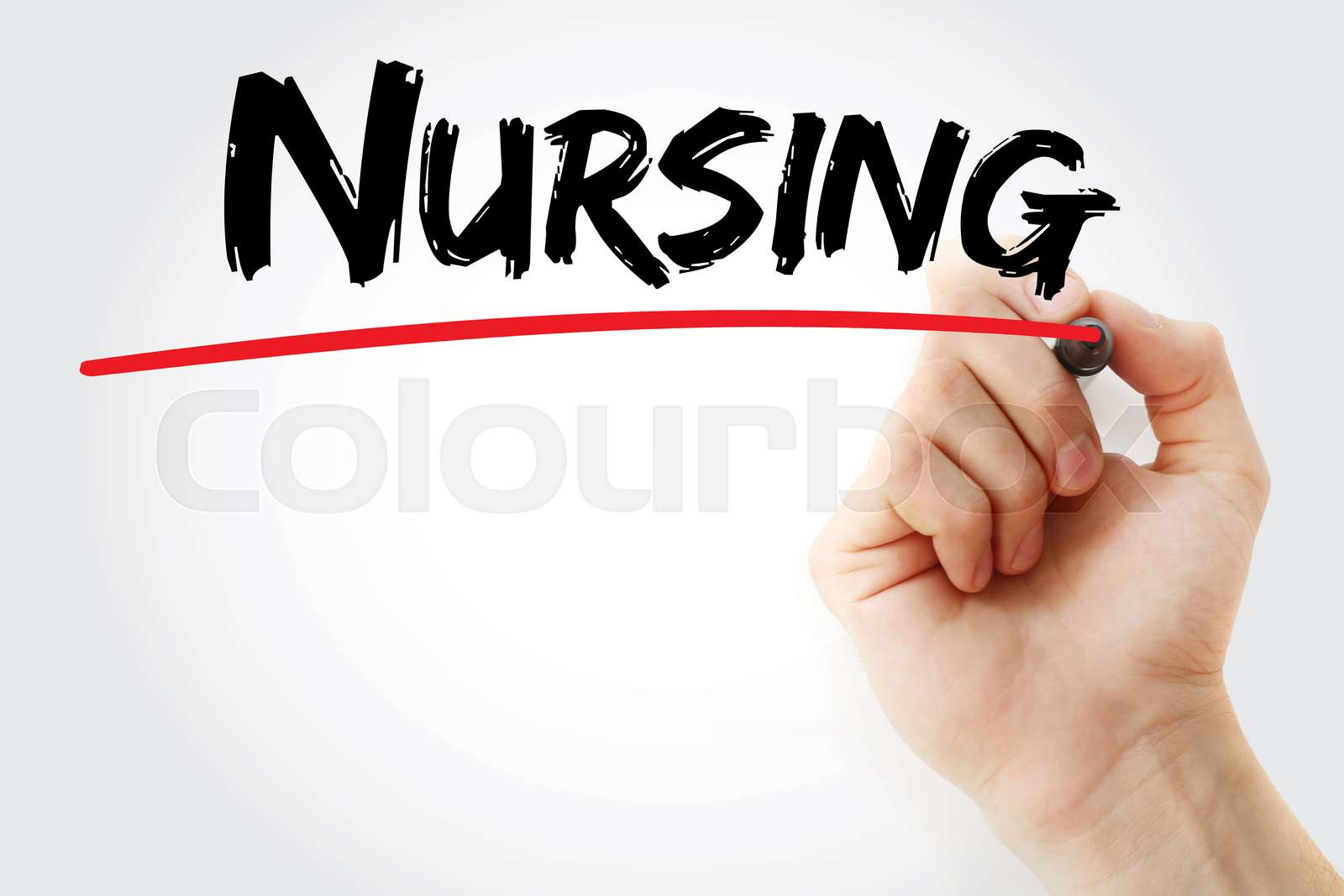 Hand writing Nursing with marker | Stock image | Colourbox