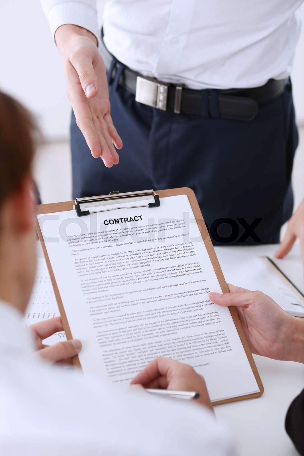 Male arm in shirt offer contract form on clipboard | Stock image ...