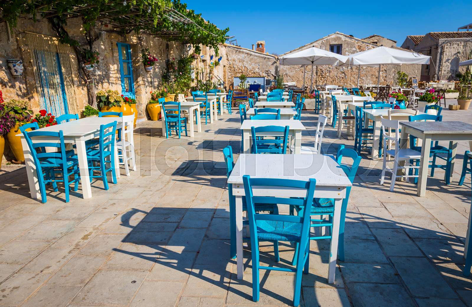 Tables in a traditional Italian Restaurant in Sicily | Stock image ...