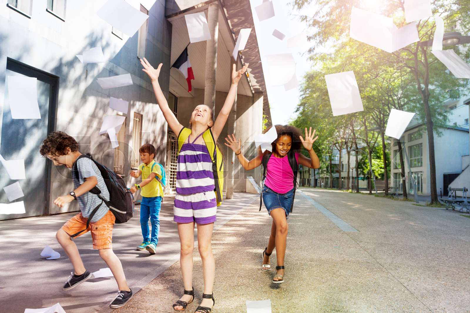 Kids having fun in the school yard | Stock image | Colourbox