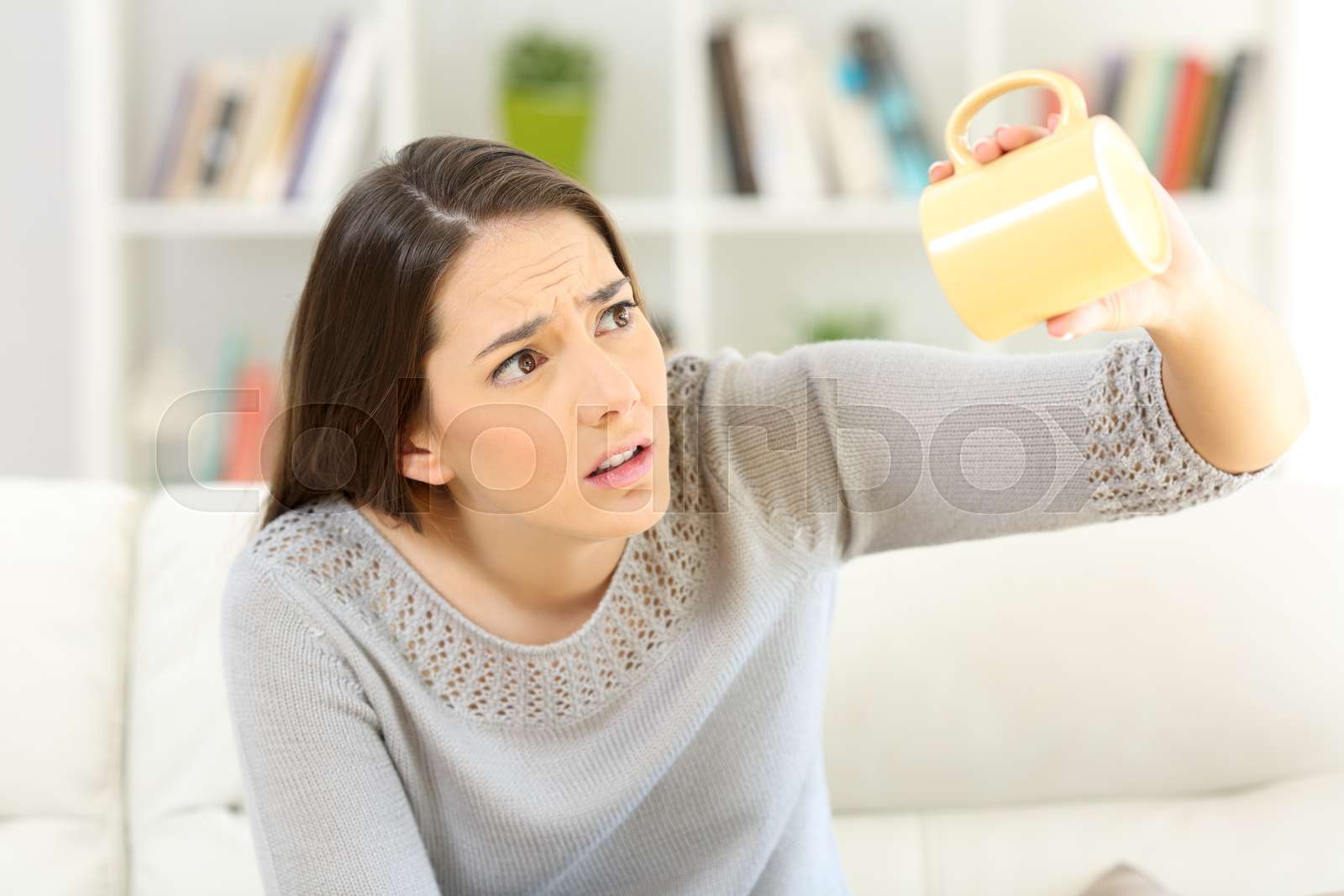 Stressed woman without coffee | Stock image | Colourbox