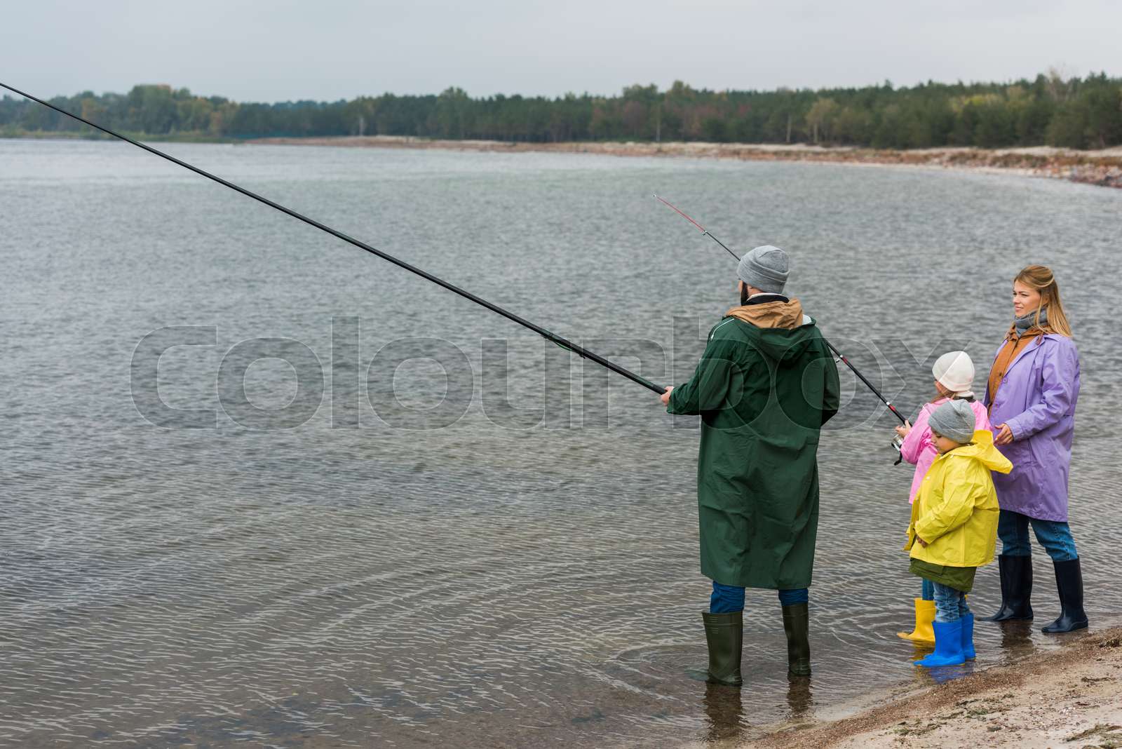family fishing together | Stock image | Colourbox