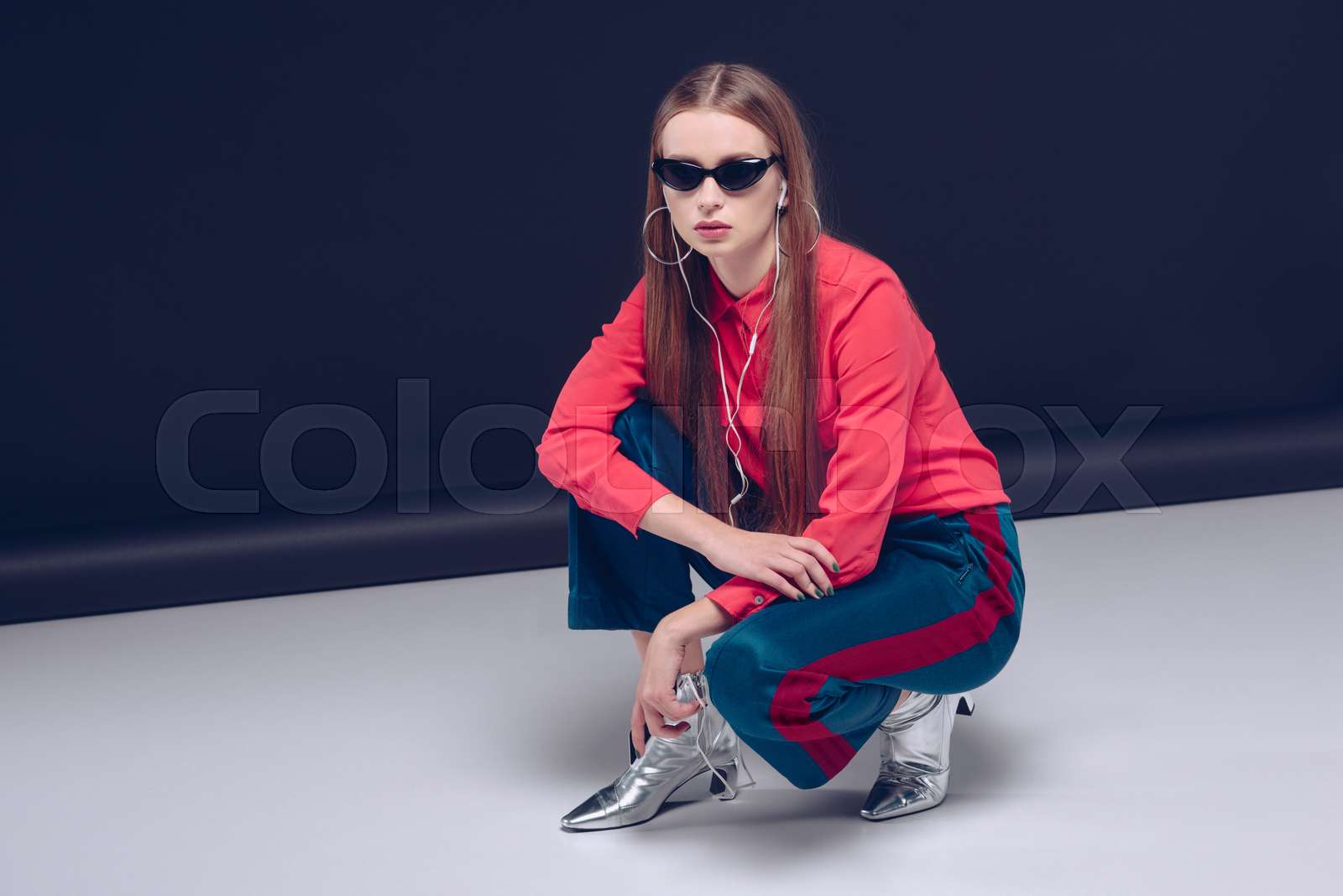 Girl Squatting Stock Image Colourbox