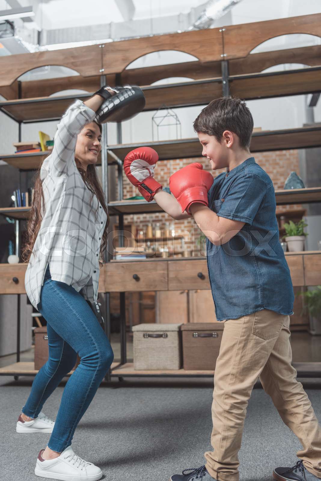 Mother and son practice boxing | Stock image | Colourbox