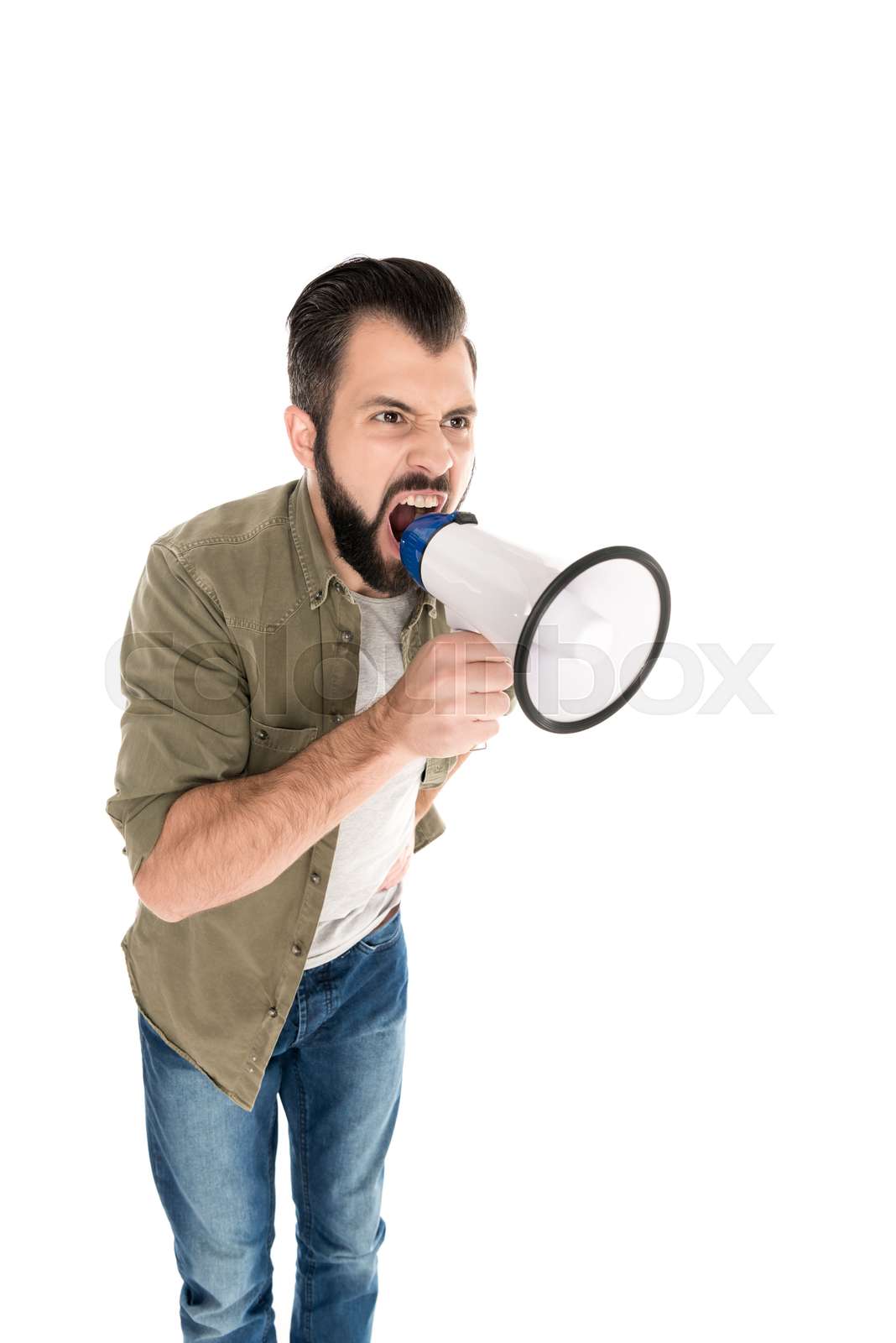 angry man yelling into loudspeaker | Stock image | Colourbox