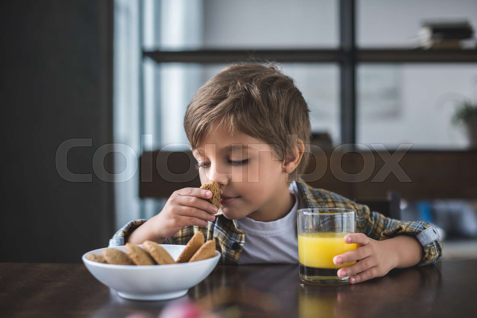 little boy during breakfast at home | Stock image | Colourbox