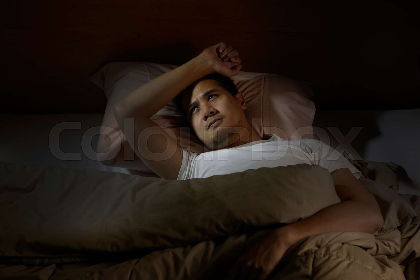 Man suffering from insomnia | Stock image | Colourbox