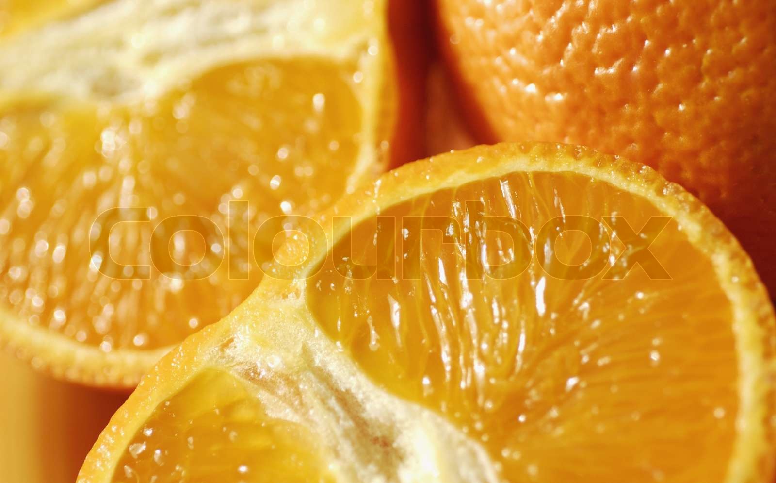 Close-up of the cross section of oranges | Stock image | Colourbox