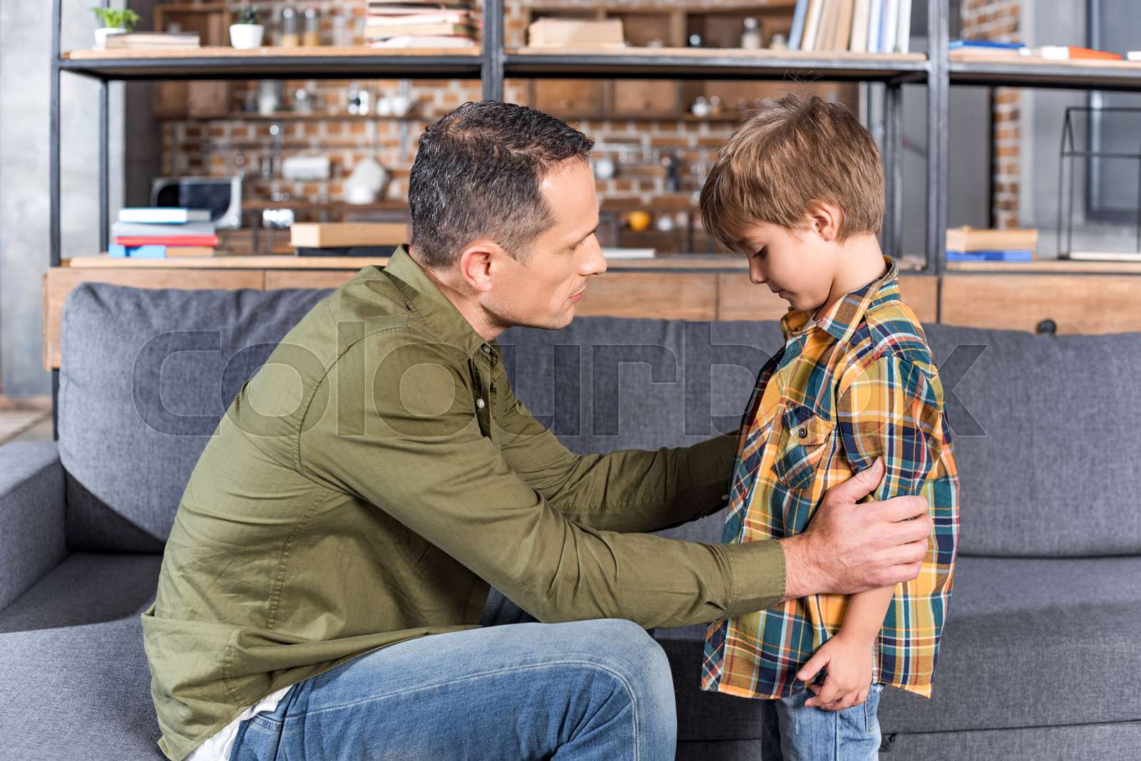 father talking to depressed son | Stock image | Colourbox