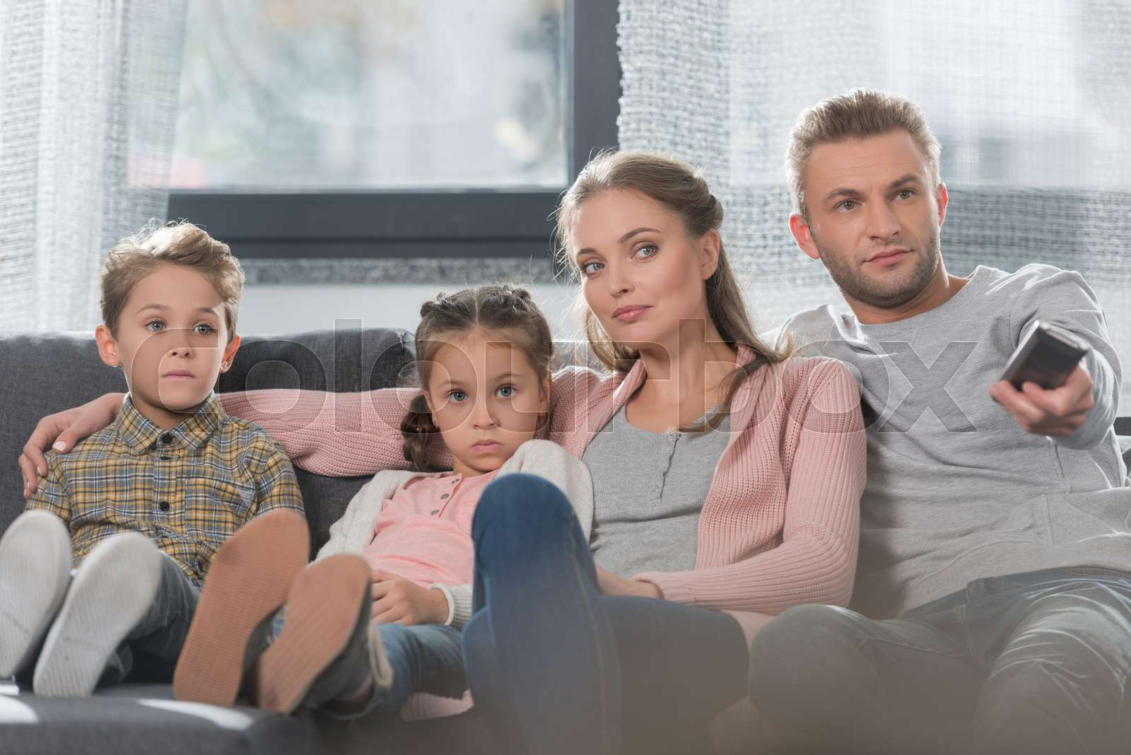 Family watching TV | Stock image | Colourbox