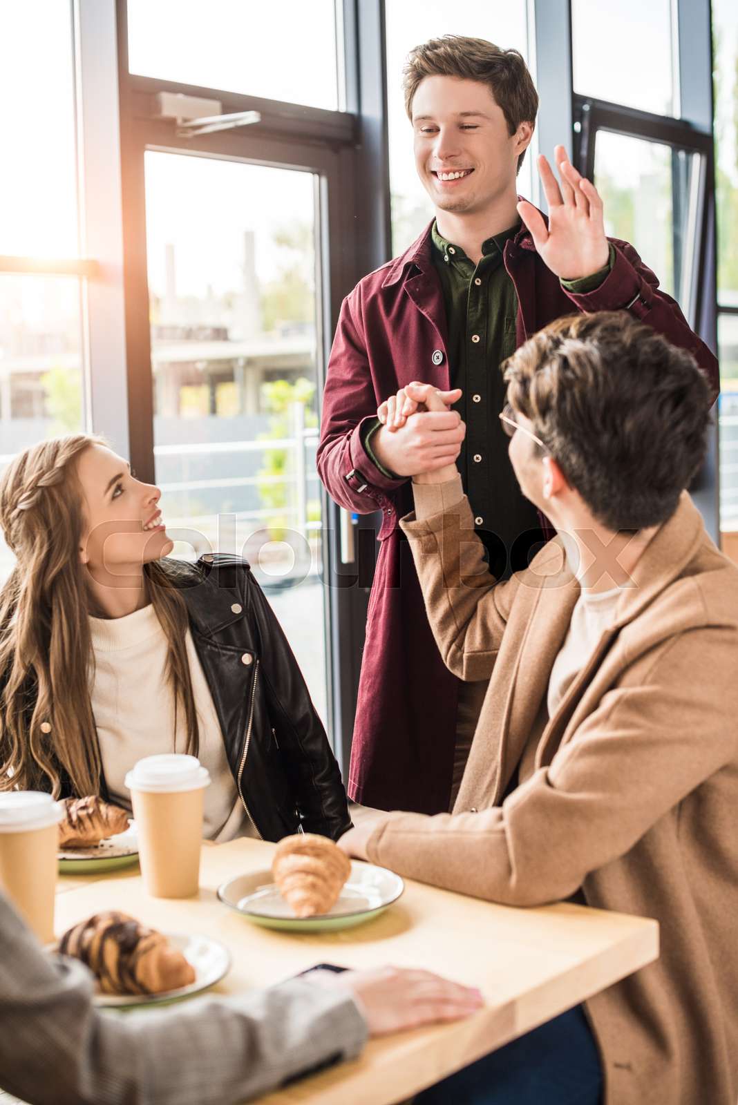 Man shaking hand to friend | Stock image | Colourbox